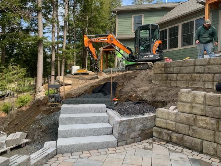 Granite and Paver Hardscape Design with Retaining and Sitting Walls