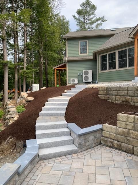Granite and Paver Hardscape Design with Retaining and Sitting Walls